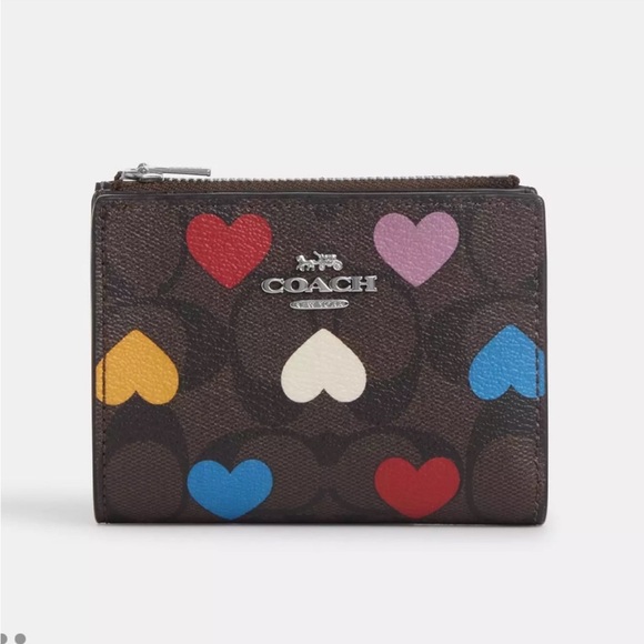 Coach | Bags | Coach Bifold Wallet In Signature Canvas With Heart Print ...